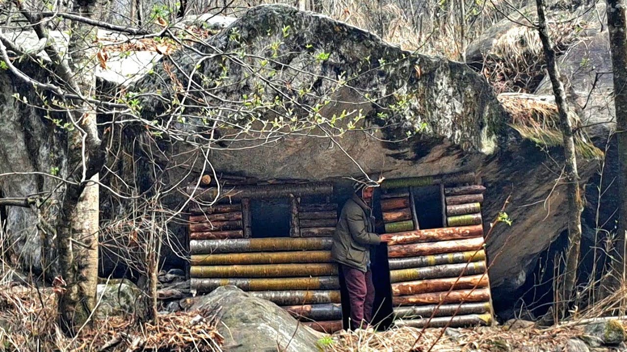 Alone build bushcraft shelter with fireplace under a stone | survival ...