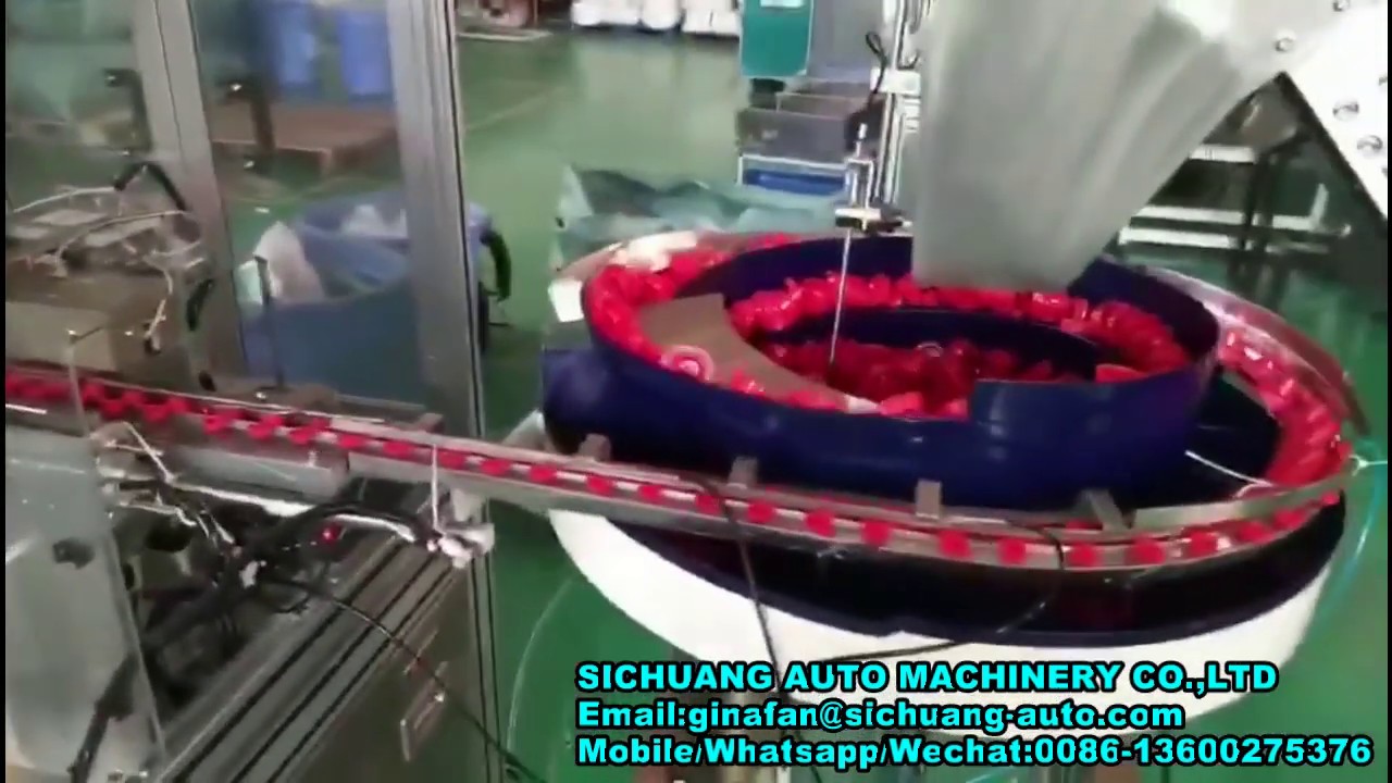 cap auto assembly machine - YouTube