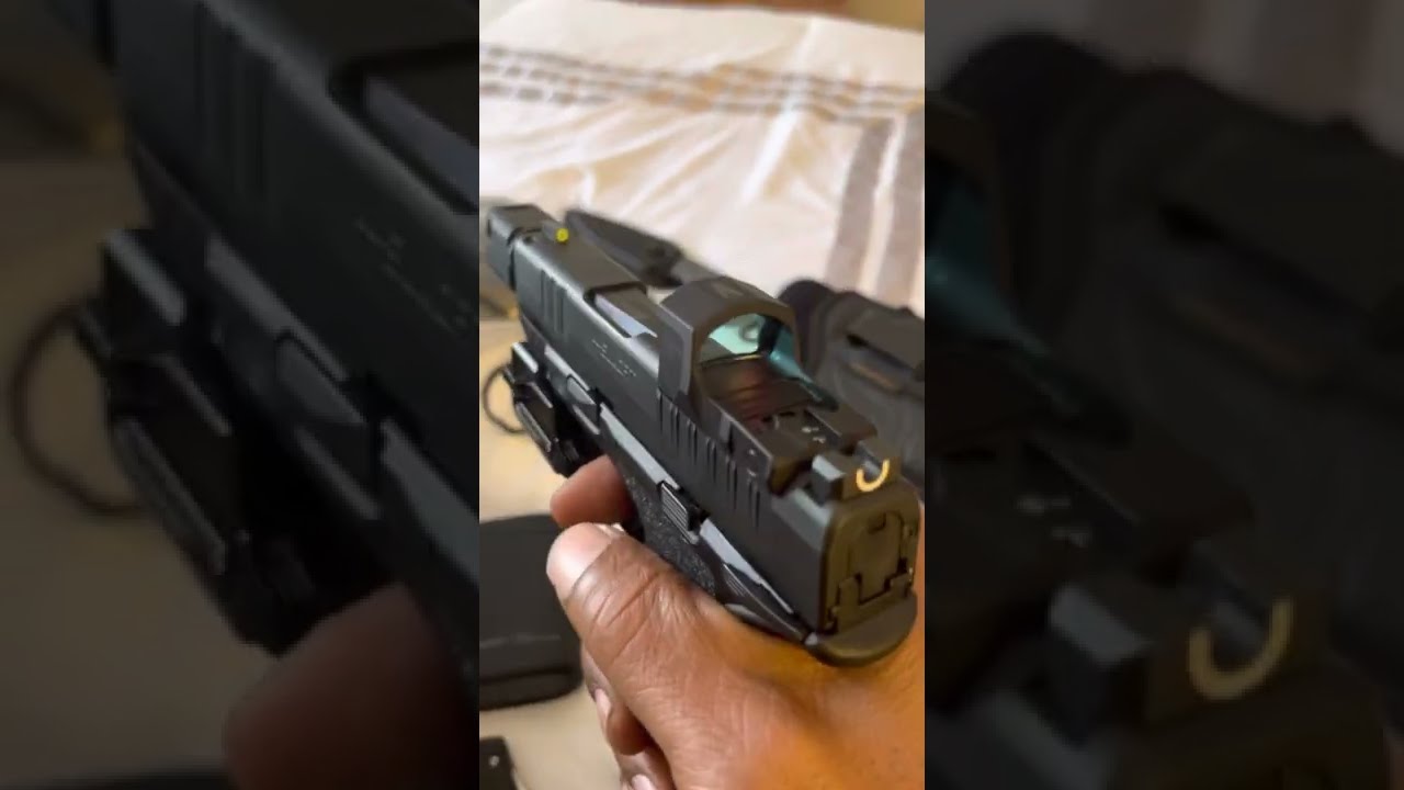 Springfield hellcat with 50 round drum mag - YouTube