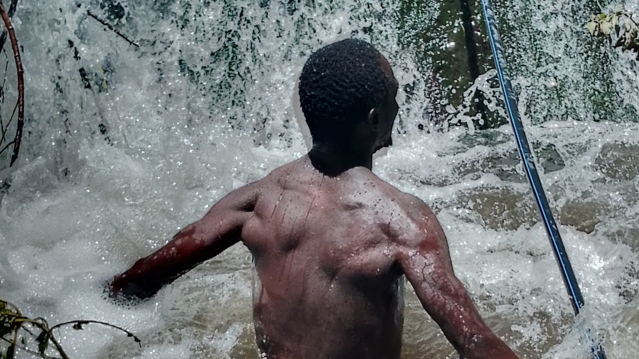 A Swim and a bath in an African waterfall #travelvlog - YouTube