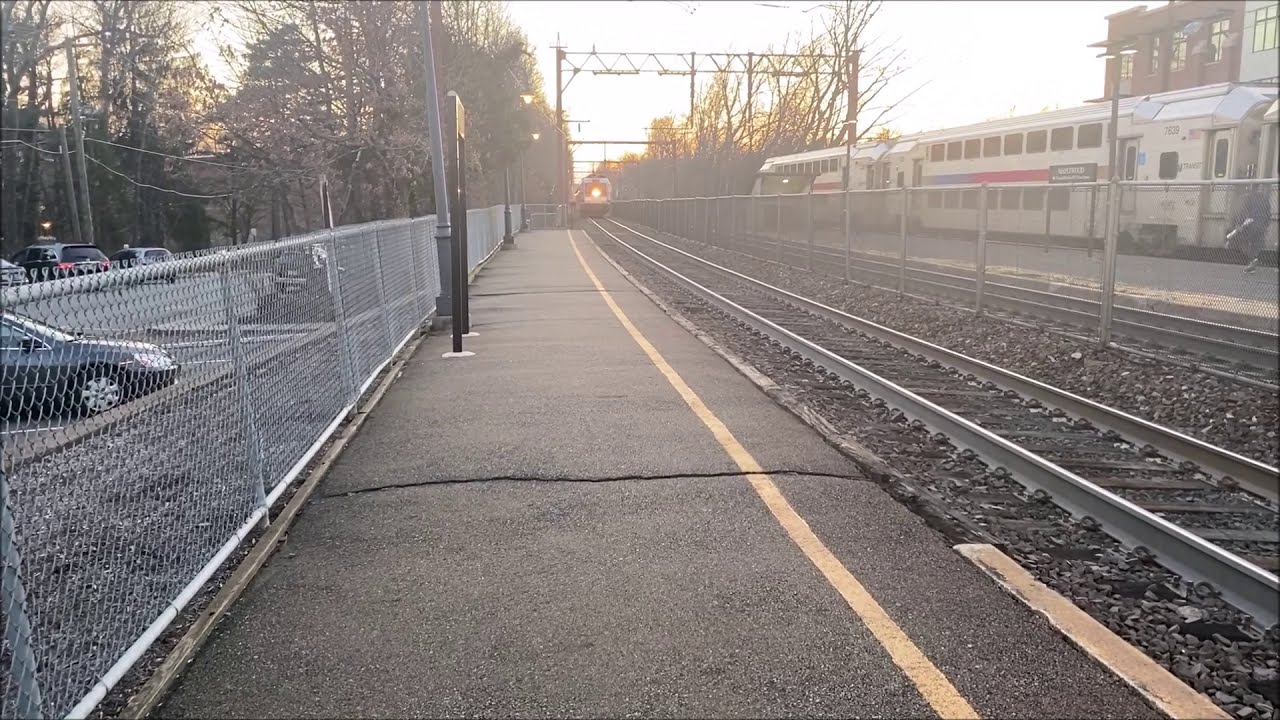 NJ TRANSIT Train 6934 Ariving and departing Maplewood station with ...
