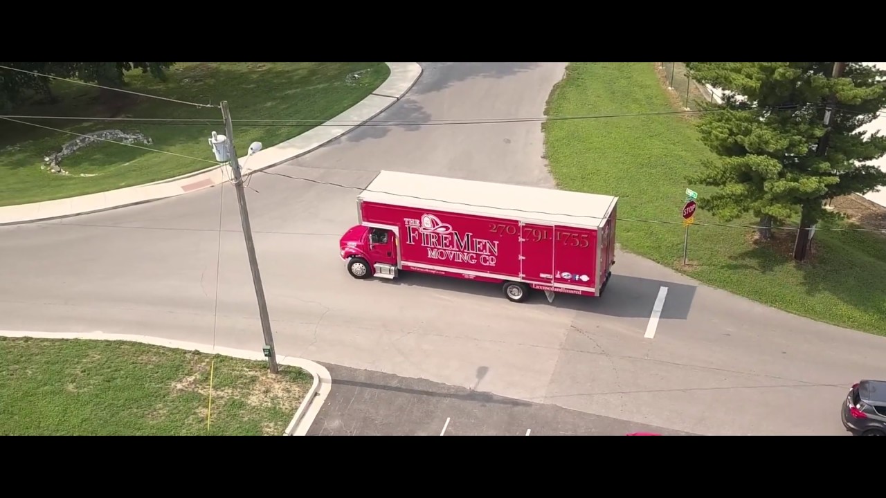 Firemen Moving Company: Drone Footage of Big Red Moving Truck - YouTube