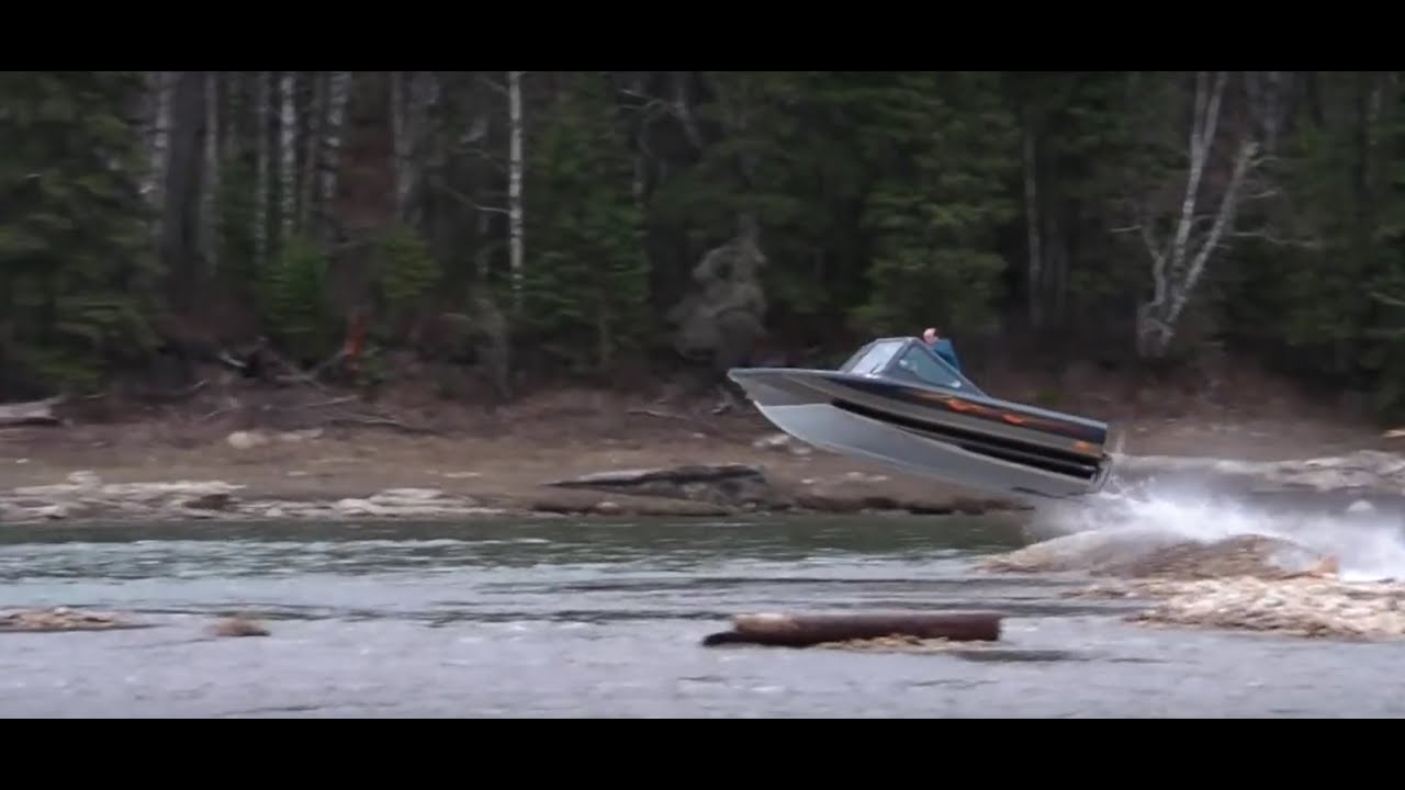 River Boat Jumps Rock Bar - YouTube