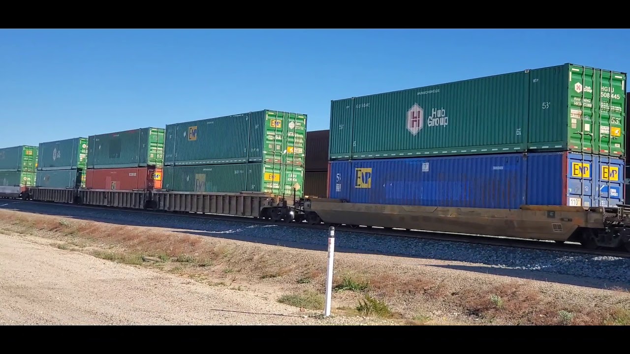 Eastbound Union Pacific intermodal train and two UP WB intermodal ...