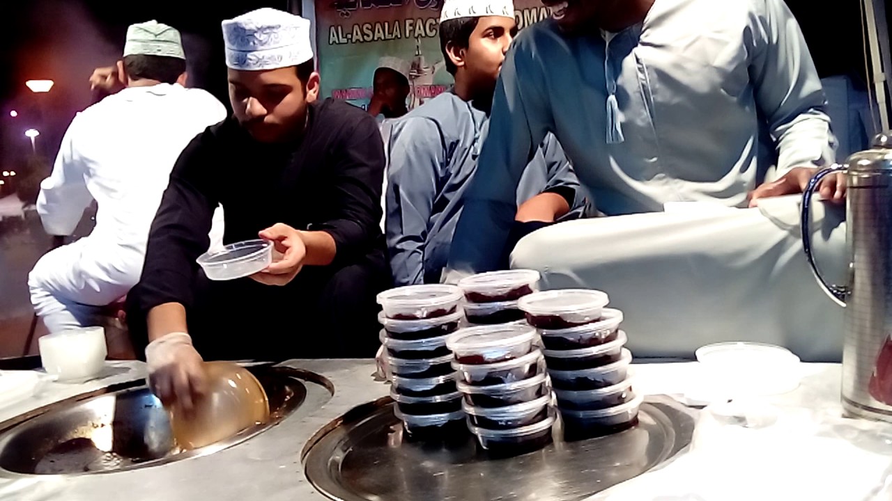 Traditional Omani halwa making in Muscat festival in Oman - YouTube