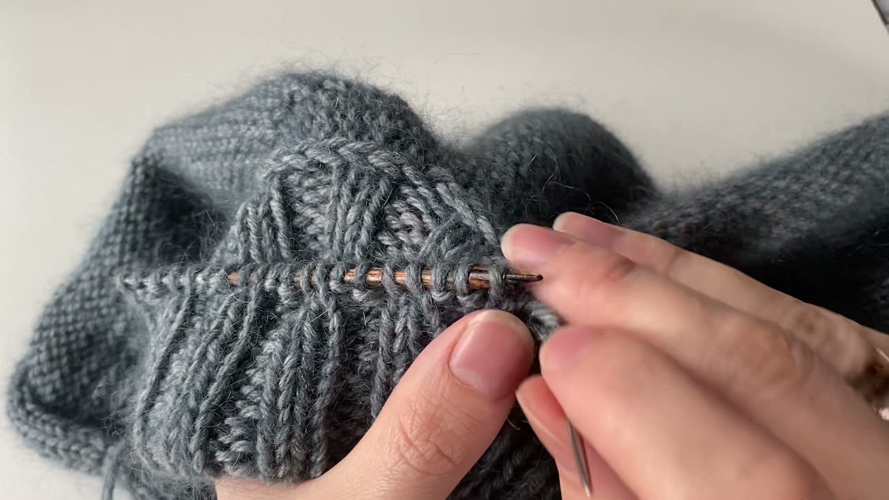 Folding neck inside and knitting together with first round - YouTube
