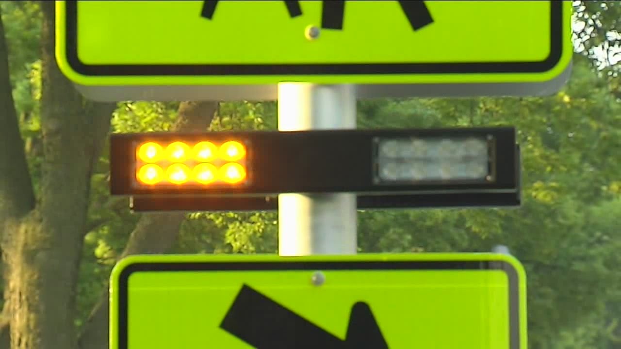 LED crosswalk signs installed on school routes in Wauwatosa - YouTube