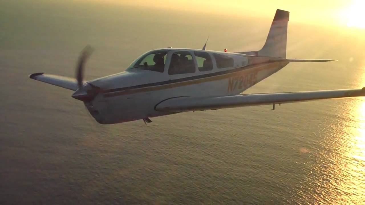 Flying Bonanza F33 at Sunset over the coast in Malibu - YouTube