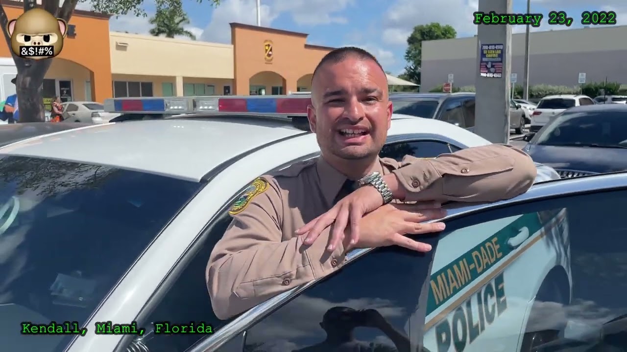 Unprofessional Cop - Miami, Florida - leaves running vehicle unattended ...