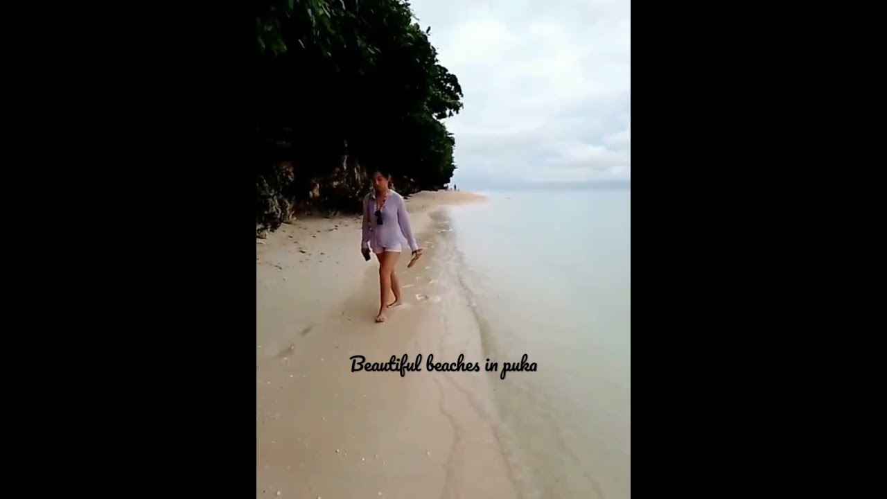 Beautiful girl walking in puka beach with a beautiful smile - YouTube