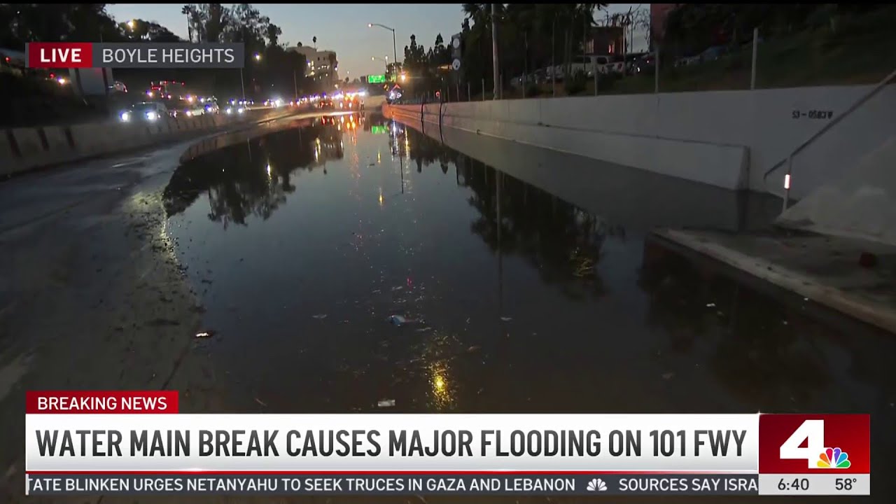 Water main break causes major flooding on 101 Freeway - YouTube