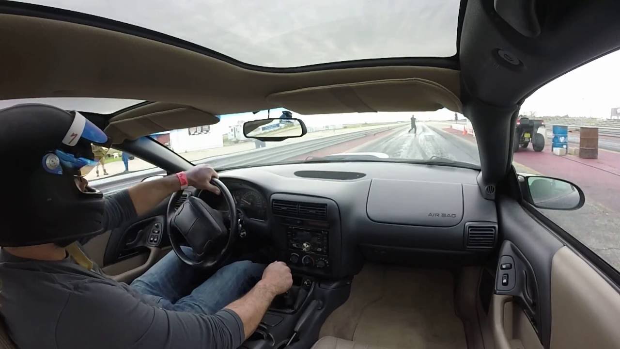 Stock LS1 M6 Camaro getting gapped by a Boss 302 - YouTube