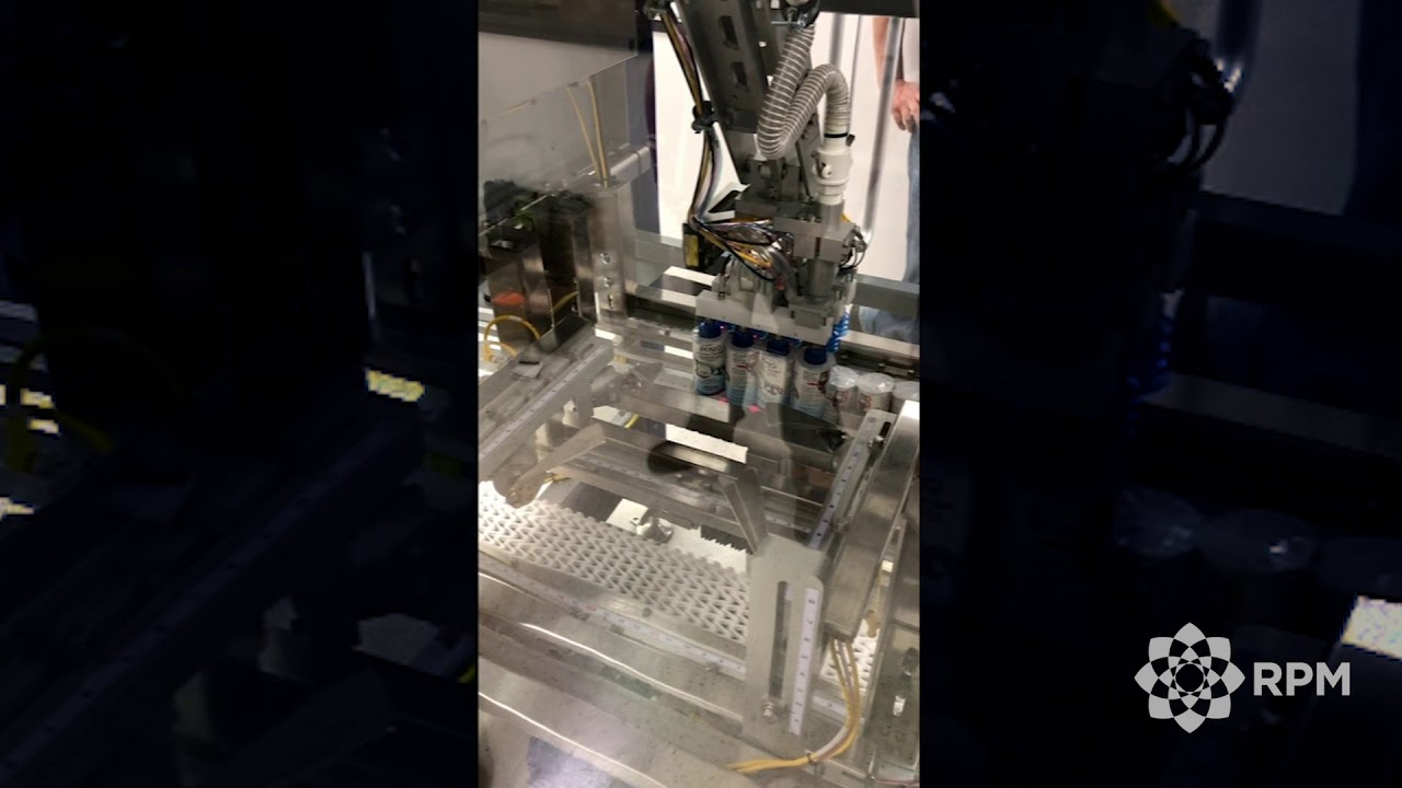 RPM TL2 Case Packer - Packing Medical Devices Into RSC Cases - YouTube