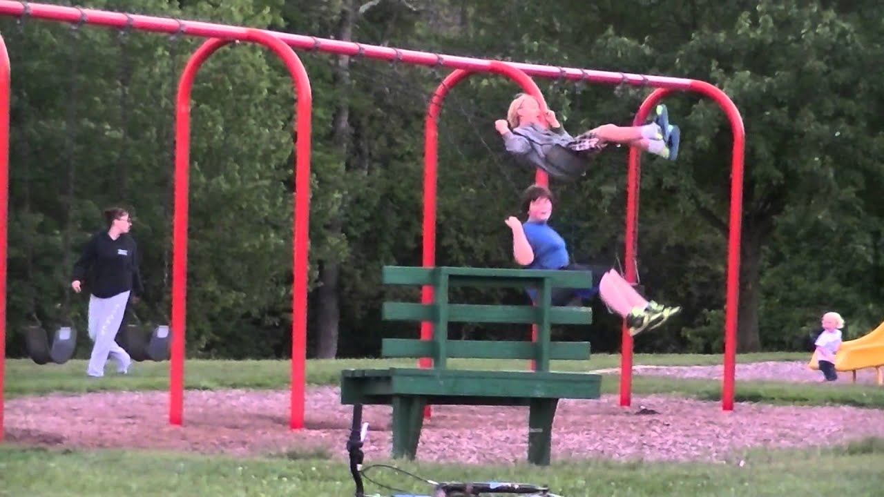 William and his buddy on swings - YouTube