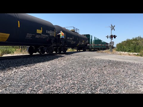 UP #5229 leads a Eastbound Manifest thru Millsap, Tx. (Conductor riding a tank car) - YouTube