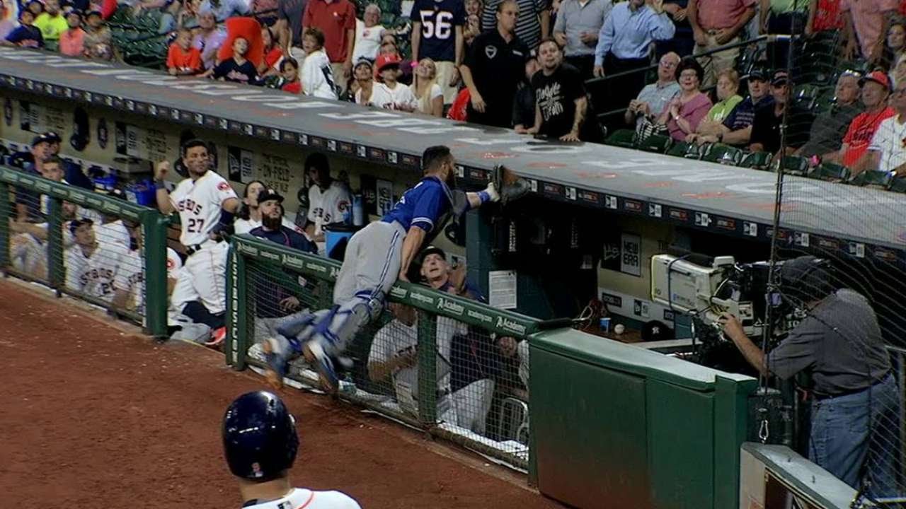 TOR@HOU: Martin nearly flips into the Astros' dugout - YouTube