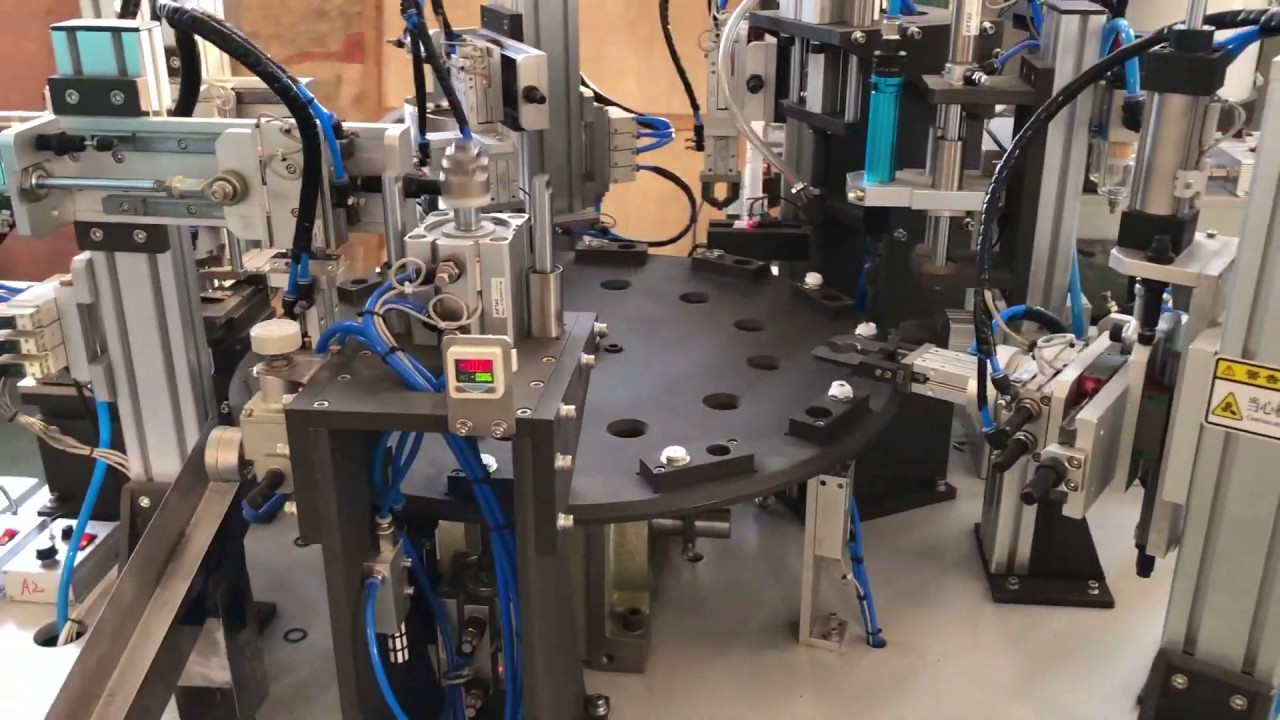 custom made automatic assembly machine - YouTube