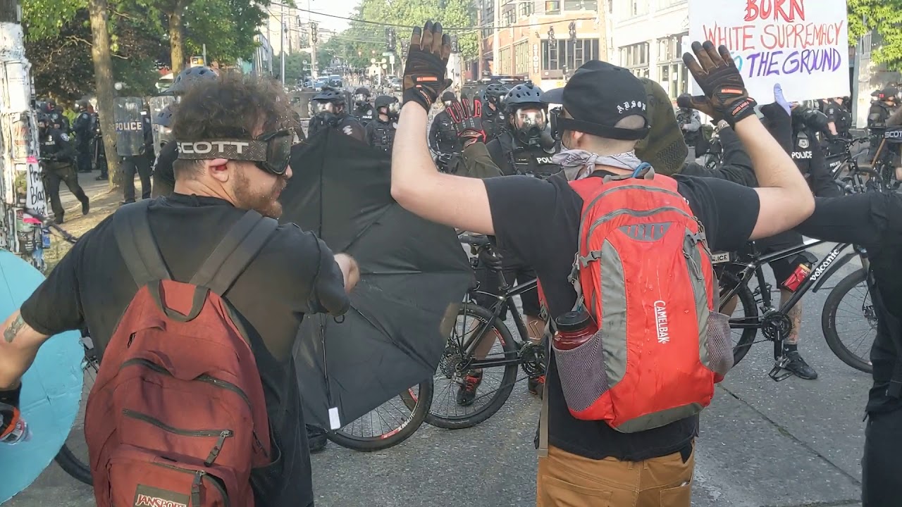 June 6 police push back - YouTube