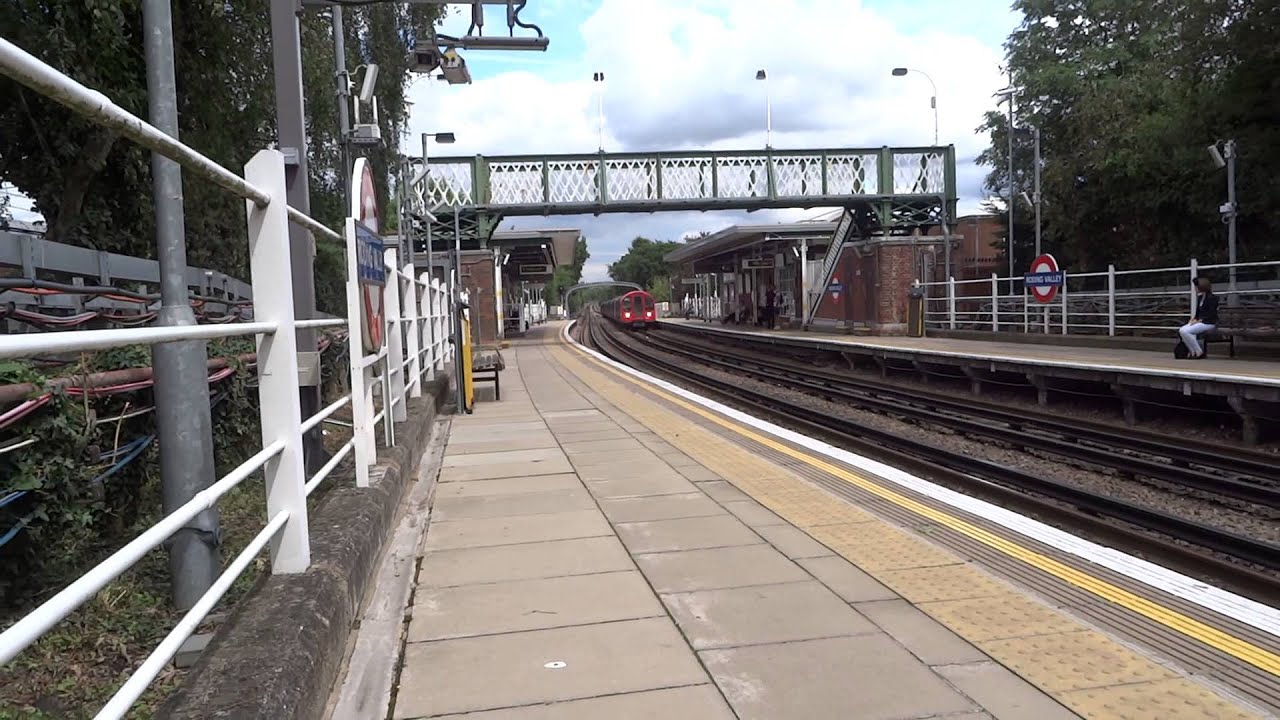 Central Line train arriving at Roding Valley - YouTube