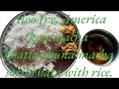 Aloo fry, America kau khatta,chuna macha soriso batta with rice eating ...