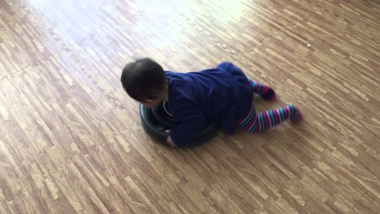 A baby rides Roomba - YouTube