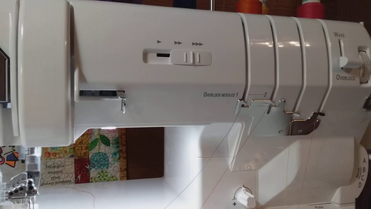 Thread a Baby Lock Triumph for a 4 thread overlock - YouTube