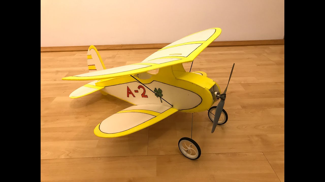 RC biplane Jupiter Junior flight in light wind - YouTube