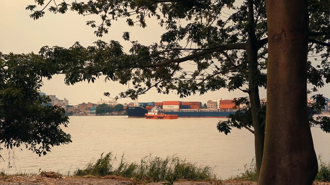 Ship guided by tug boat on Hoogli river - YouTube
