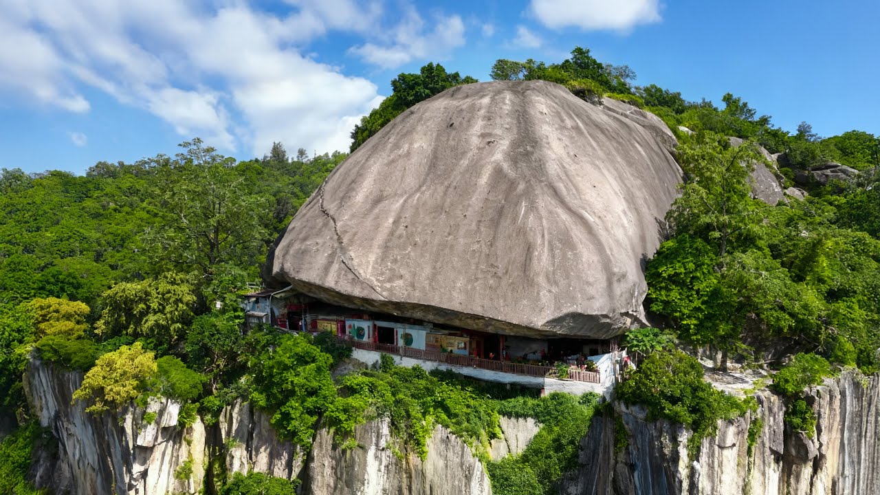 China’s Insane Cliff House: Was the Rock Built by Humans? - YouTube