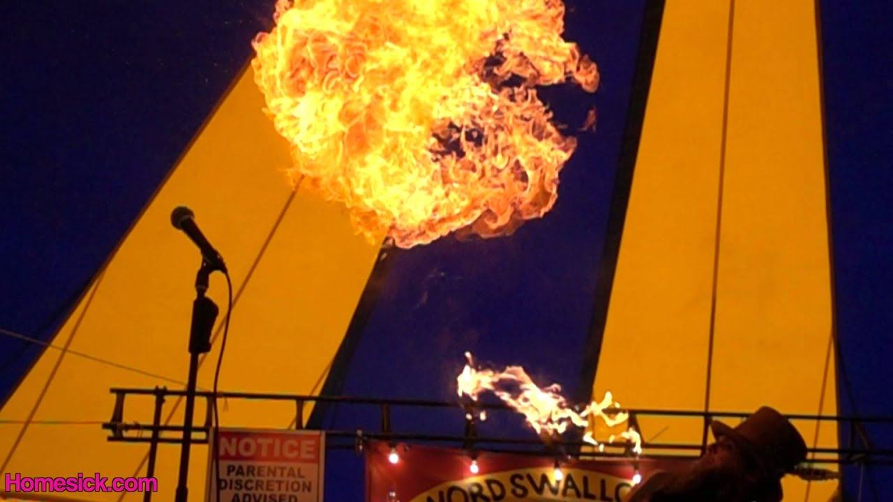 Slow motion fireball at Hellzapoppin circus freakshow (fire breathing ...