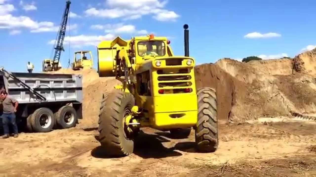 Michigan 175A loading trucks - YouTube