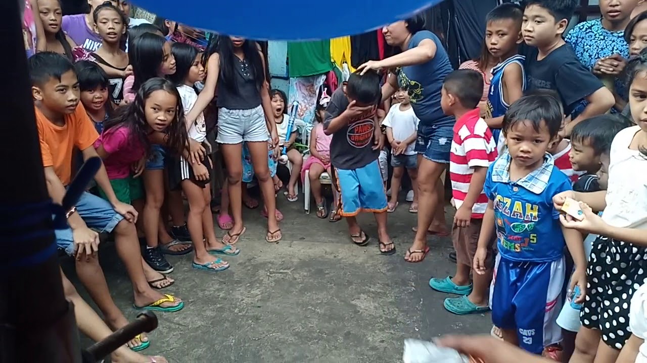 Lets go playing a philipine game pitik kalamansi - YouTube