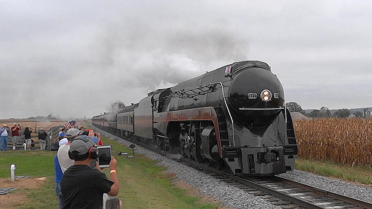 N&W #611 J Class Steam Engine Past Red Caboose Motel - YouTube