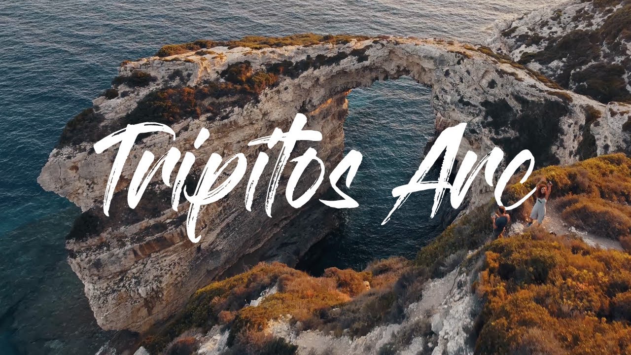 Amazing aerial view of Tripitos Natural Arch of Paxos Island, Greece ...