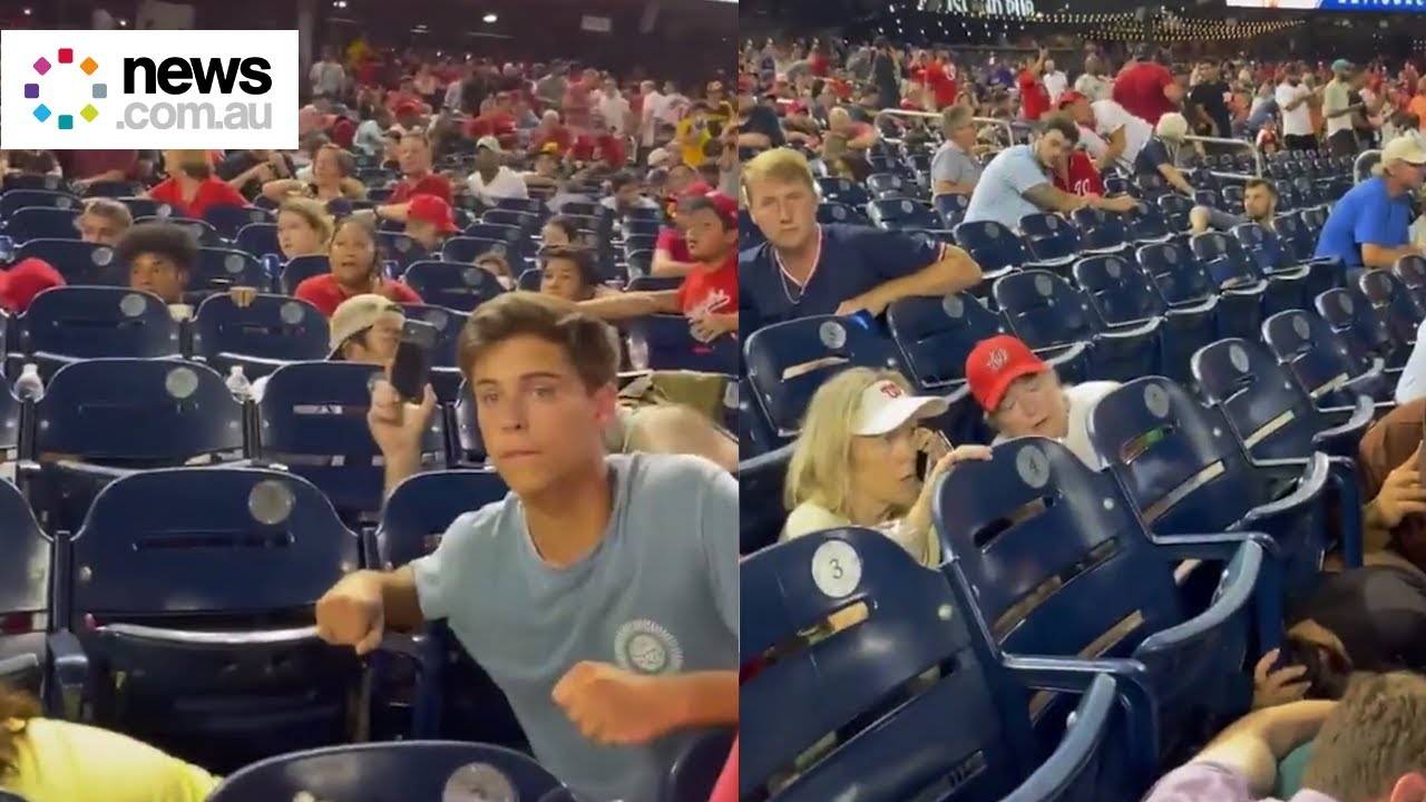 Spectators hide as shooting occurs outside American baseball game - YouTube