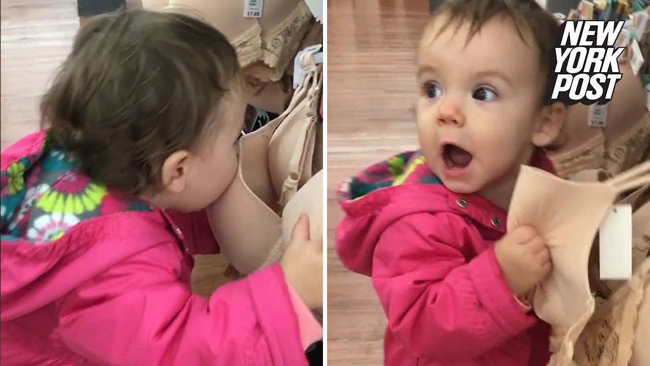 Adorable toddler tries to get milk out of a bra at Walmart - YouTube