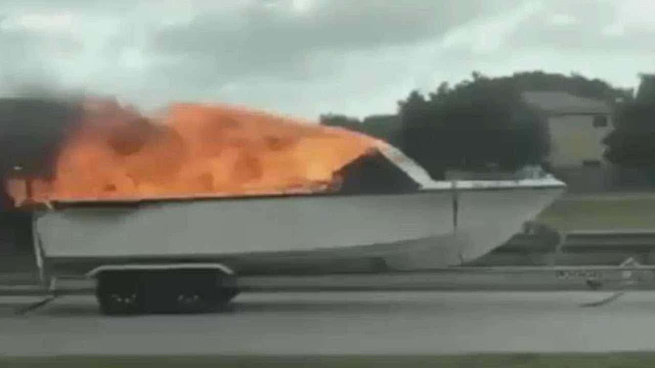 UPDATE! Video Shows Flaming Boat Being Towed Down Florida Highway - YouTube