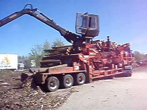 Wood cutter with Caterpillar V12 1050 Hp Engine - YouTube