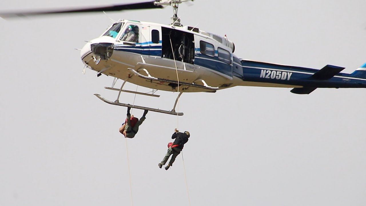 Forest Service rappel crews key to stopping small fire growth - YouTube