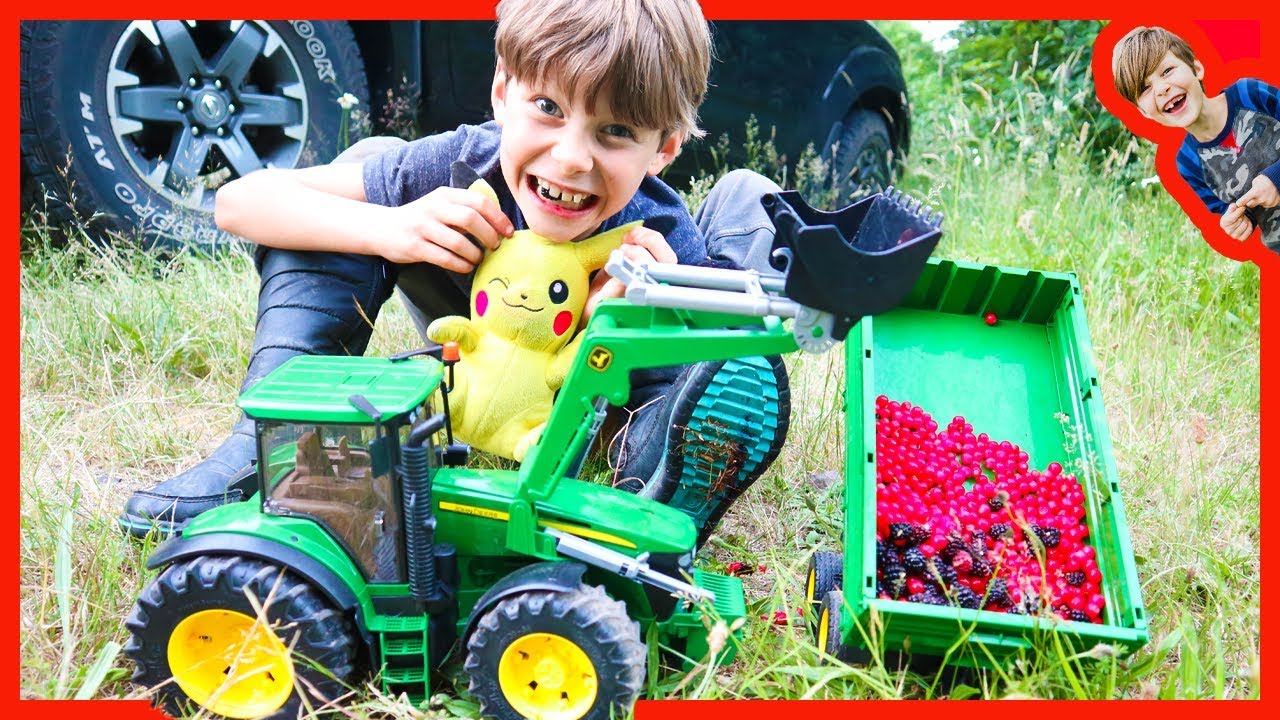 Bruder Tractors Harvest Wild Berries With Axel and Daddy - YouTube