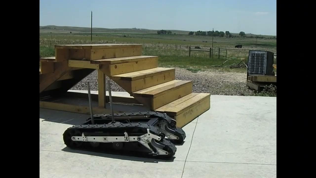 Stair climbing with shape changing tracks on a mobile robot. - YouTube