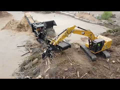 Vermeer HG6800TX Back in Black with the CMP 402B grapple slinging wood ...