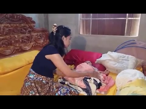 Rural life Asian nice mother skill care, Beautiful nice mom feed for chicken in the backyard,