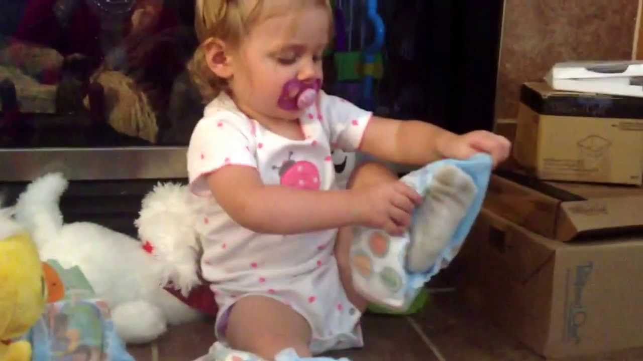 Peyton loves her swim diapers - YouTube