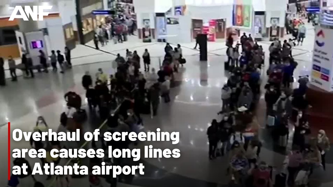Overhaul of screening area causes long lines at Atlanta airport - YouTube