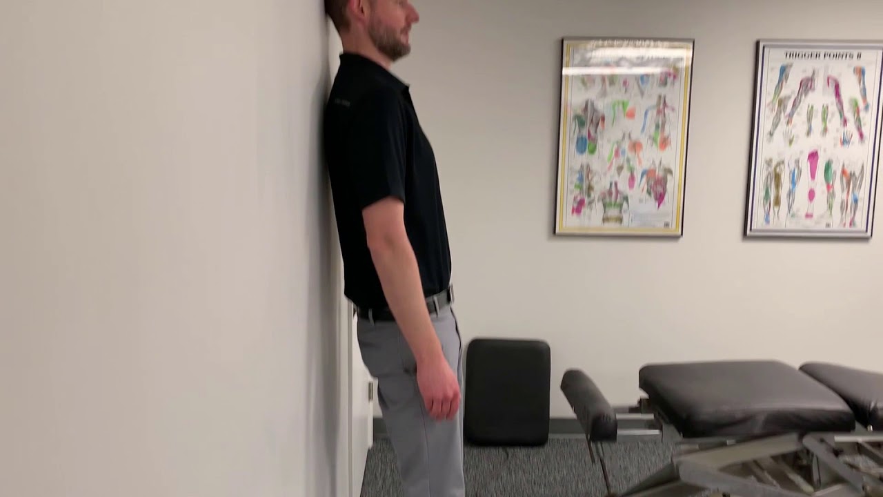 Chin Tuck on Wall Neck Strengthening - YouTube