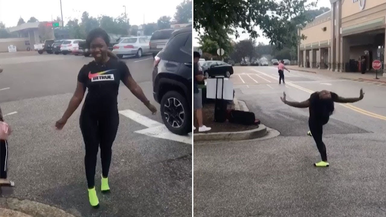 Woman Dances Around Parking Lot - YouTube