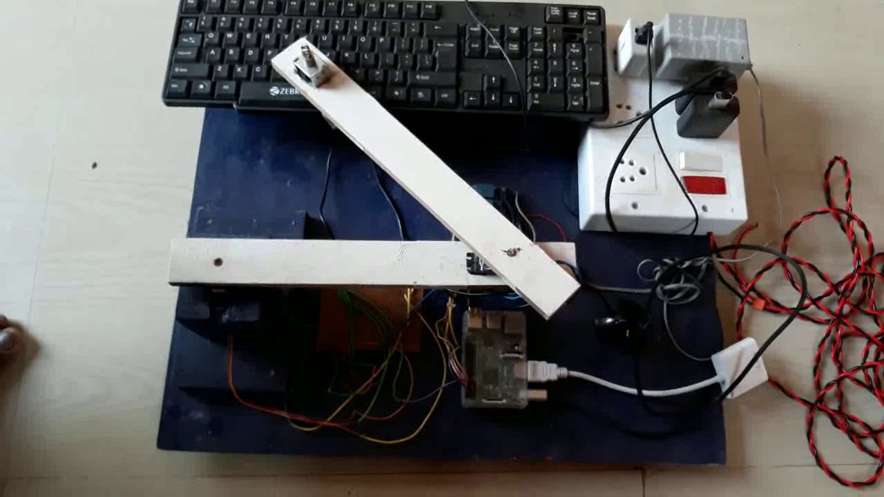 AN INTELLIGENT VOICE CONTROLLED TYPING ROBOTIC ARM FOR DISABLED - YouTube
