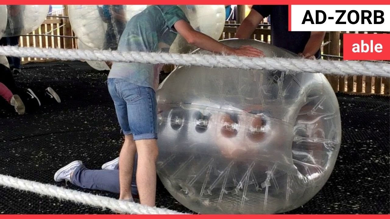 Man too fat to stand-up in big inflatable Zorbing ball | SWNS - YouTube
