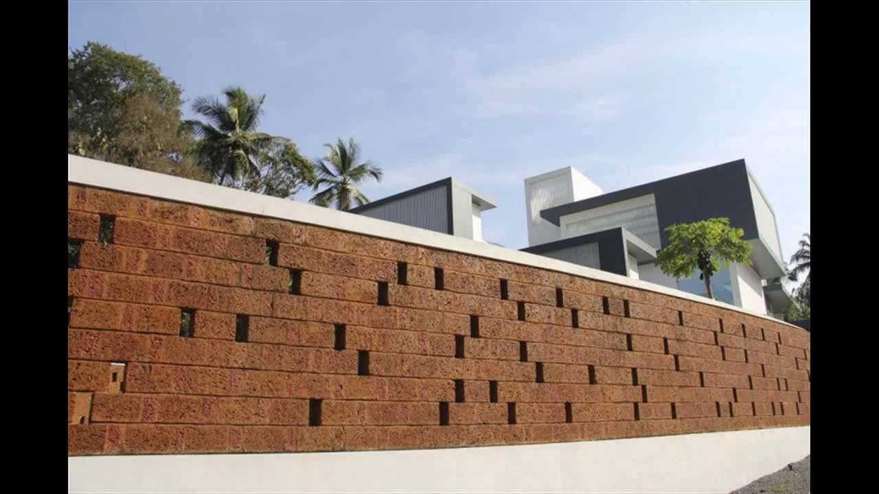 A Contemporary Residence Accentuate A Winding Laterite Rock Wall ...